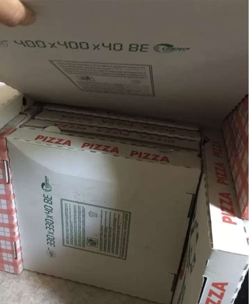 This Frequently Topless Guy Built His Own Chair Out of Pizza Boxes ...